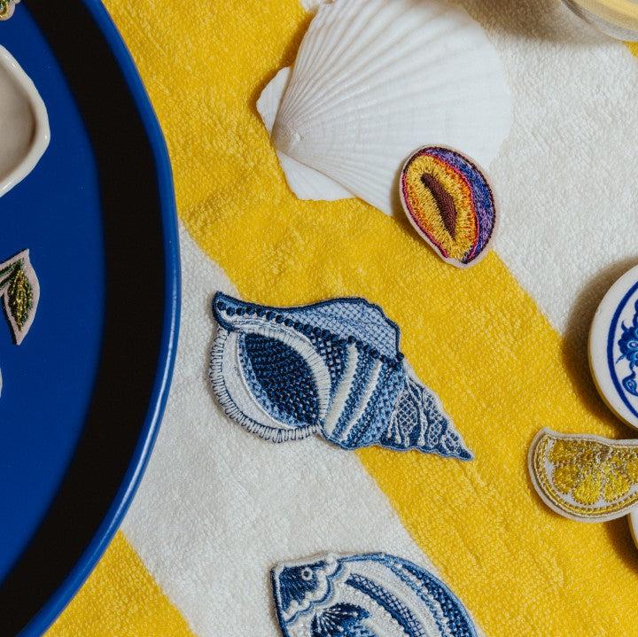 The Porcellana Shell Patch – Hand & Lock