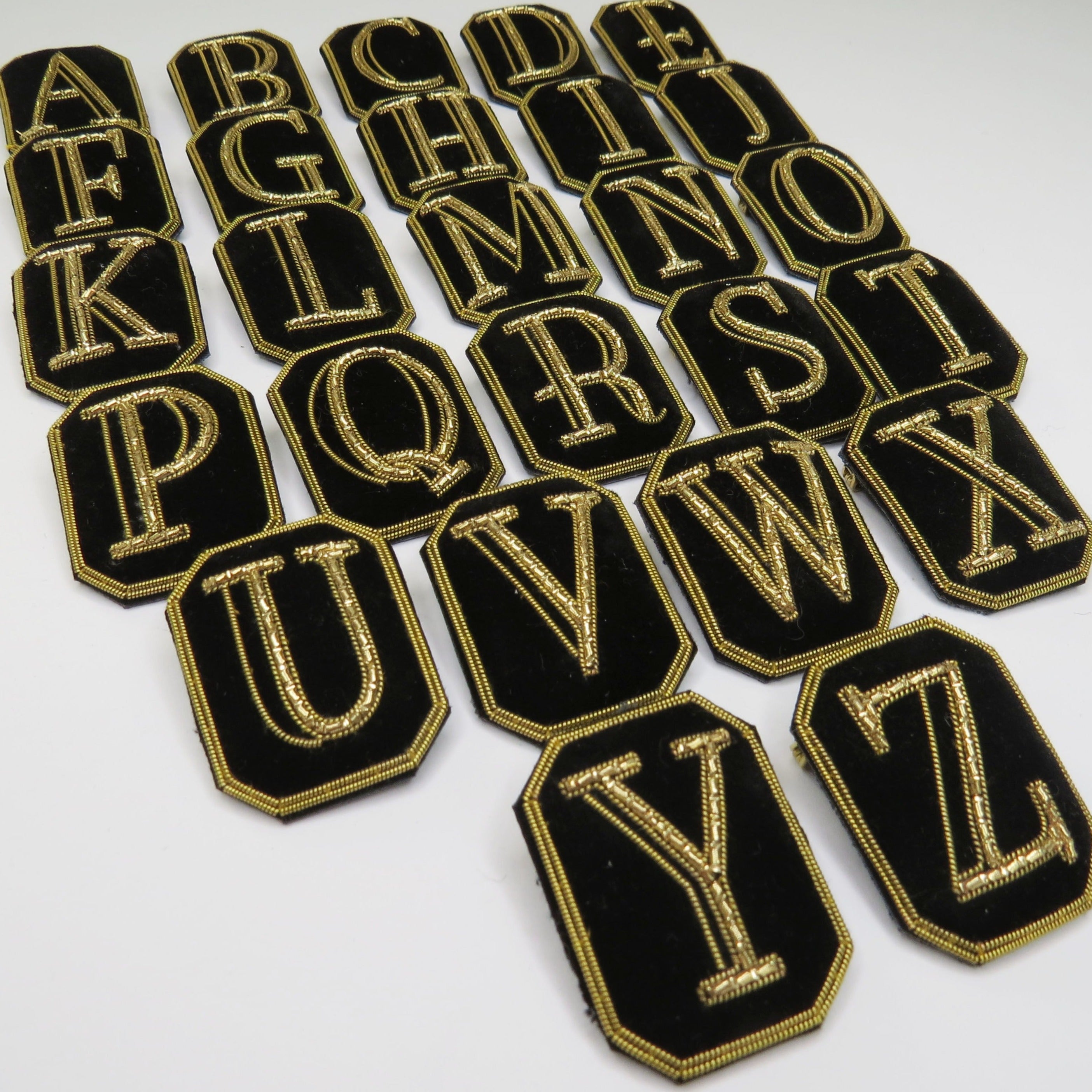 Letter brooch store